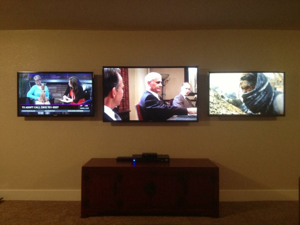 Denver-man-cave-with-multiple-smart-TVs- • Boulder Home Theater